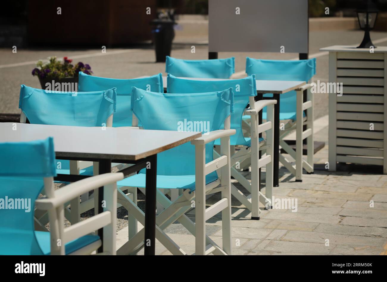 Restaurant with light blue chairs Stock Photo - Alamy
