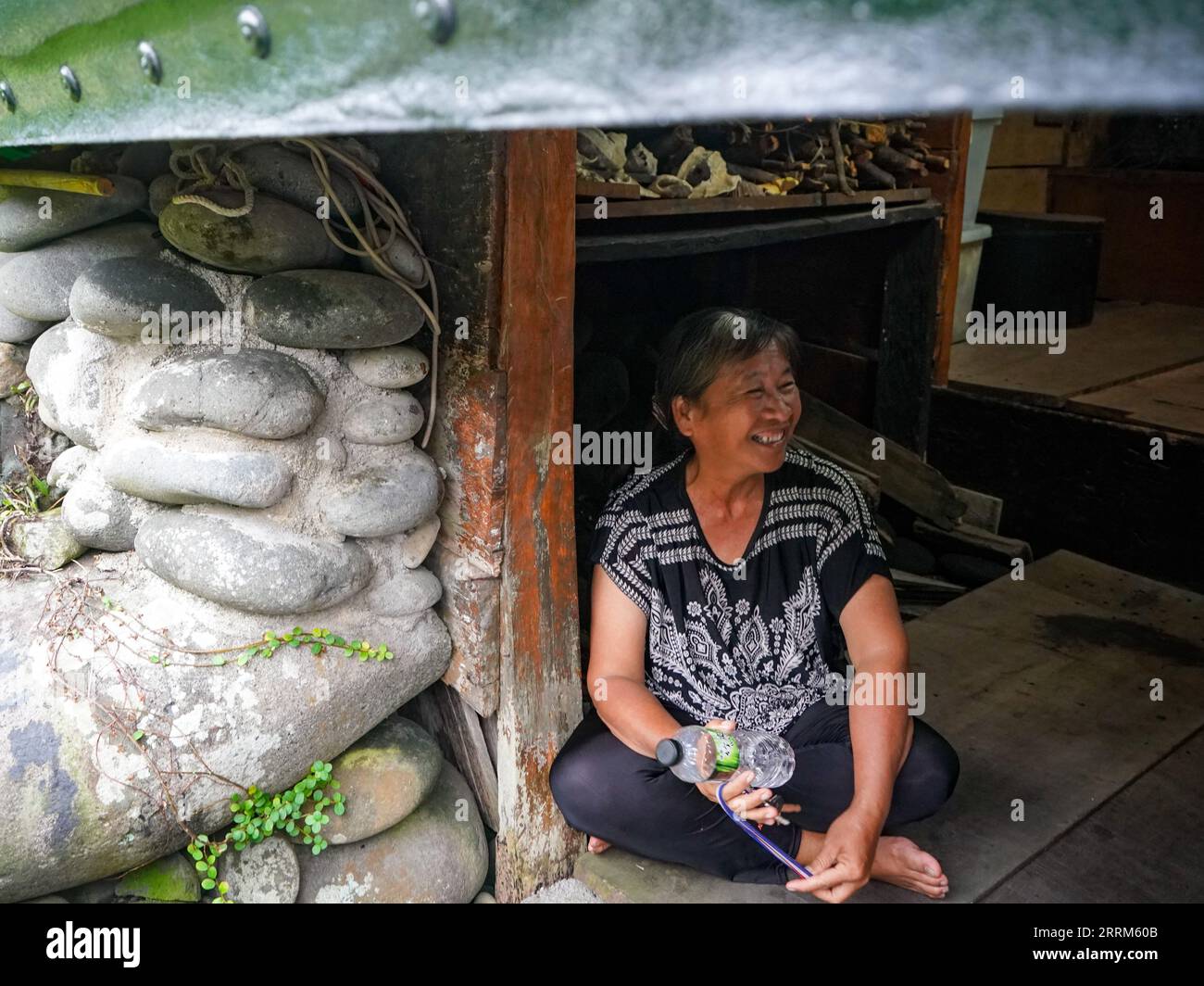 Ayoy, a mid-aged aboriginal from Tao community, is talking with a ...