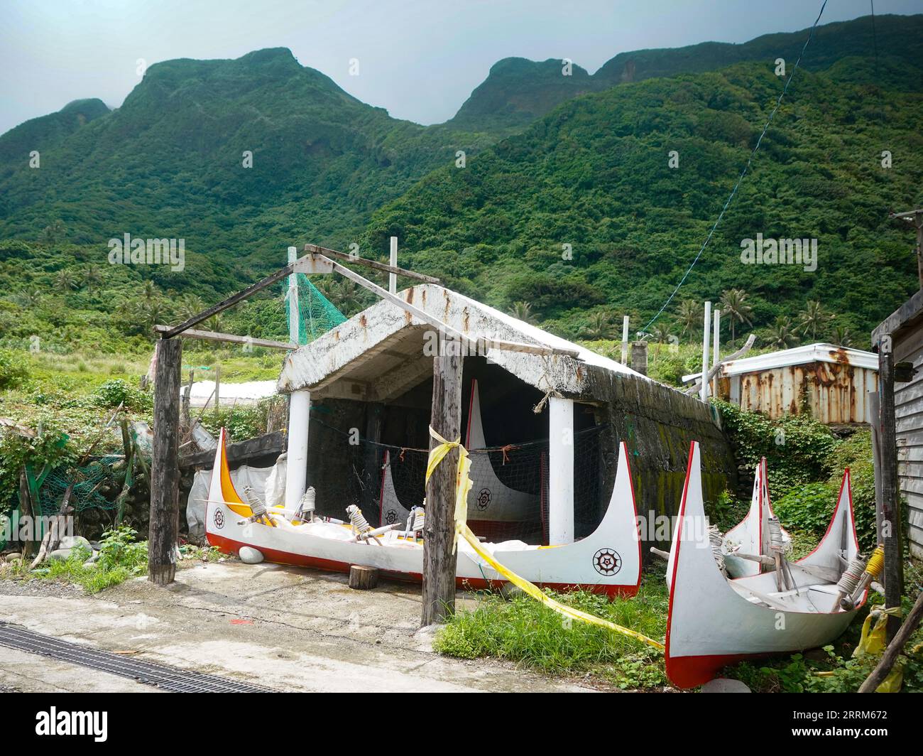 Boats with sacred colours of red, white and black representing Tao ...