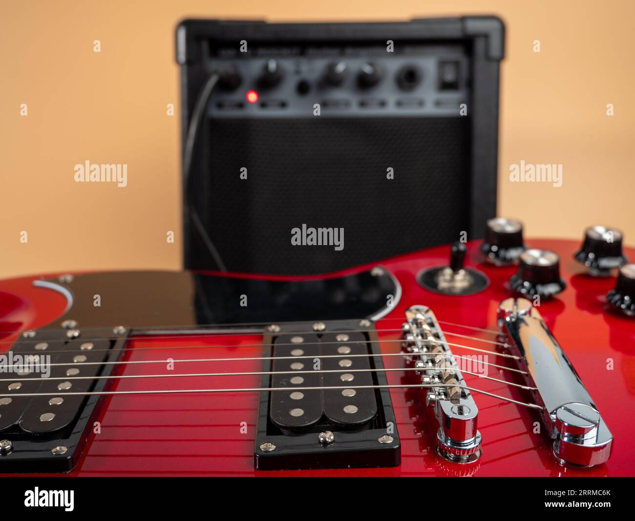Red six-string electric guitar. Electric guitar close-up Stock Photo ...