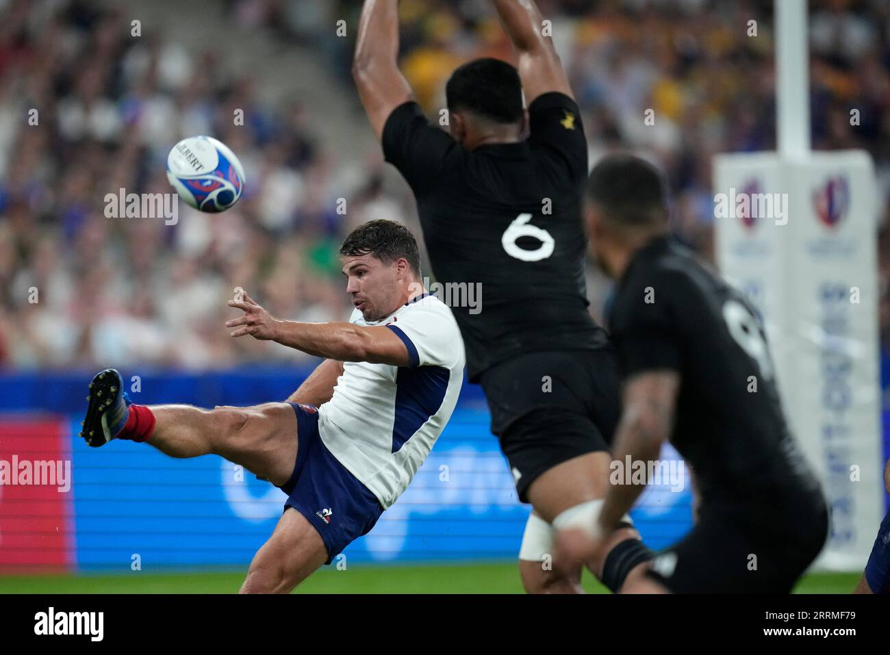 France's Antoine Dupont clears the ball during the Rugby World Cup Pool ...