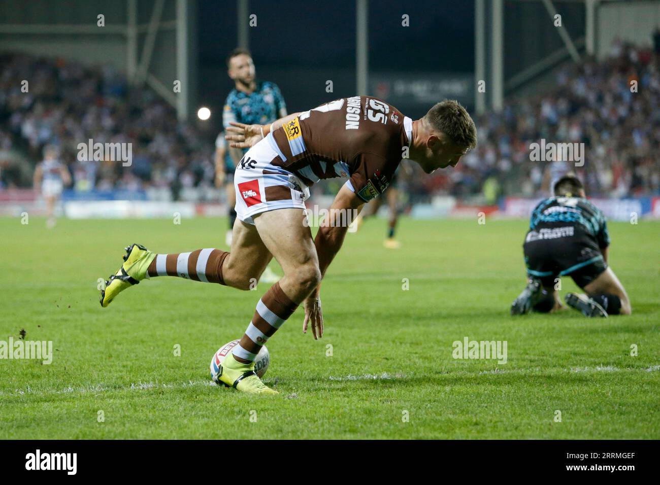 St Helens' Tommy Makinson scores their sides first try during the ...