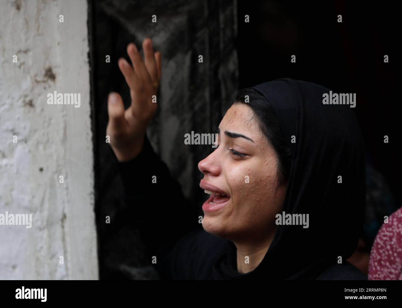 221109 -- NABLUS, Nov. 9, 2022 -- A woman mourns Mahdi Hashash, who was ...