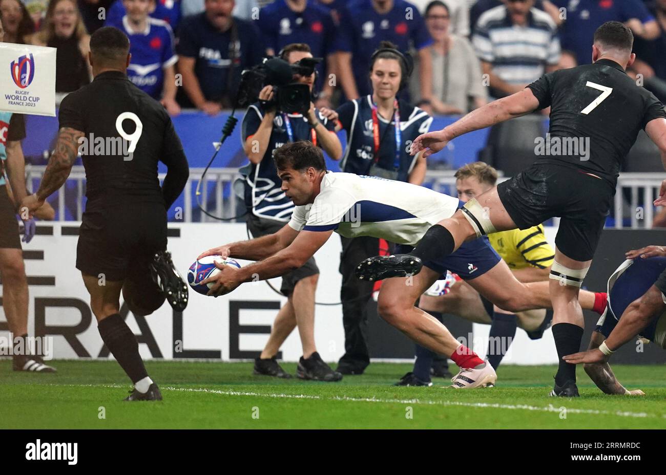 France's Damian Penaud scores their side's first try to take the lead ...