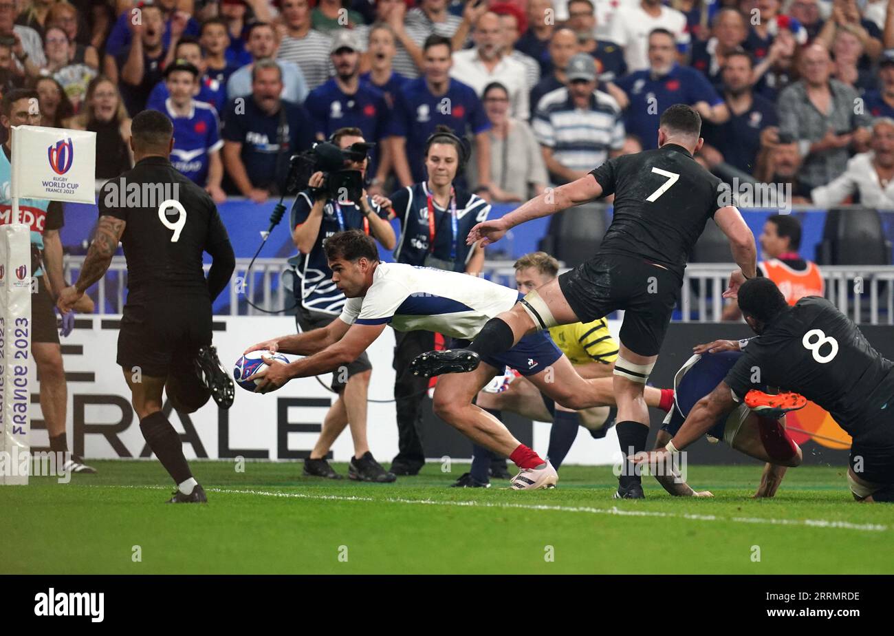 France's Damian Penaud scores their side's first try to take the lead ...