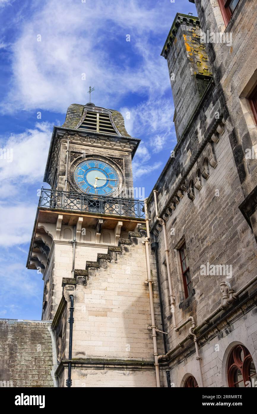 Clock tower of medieval Dunrobin Castle on the east coast of Scotland ...