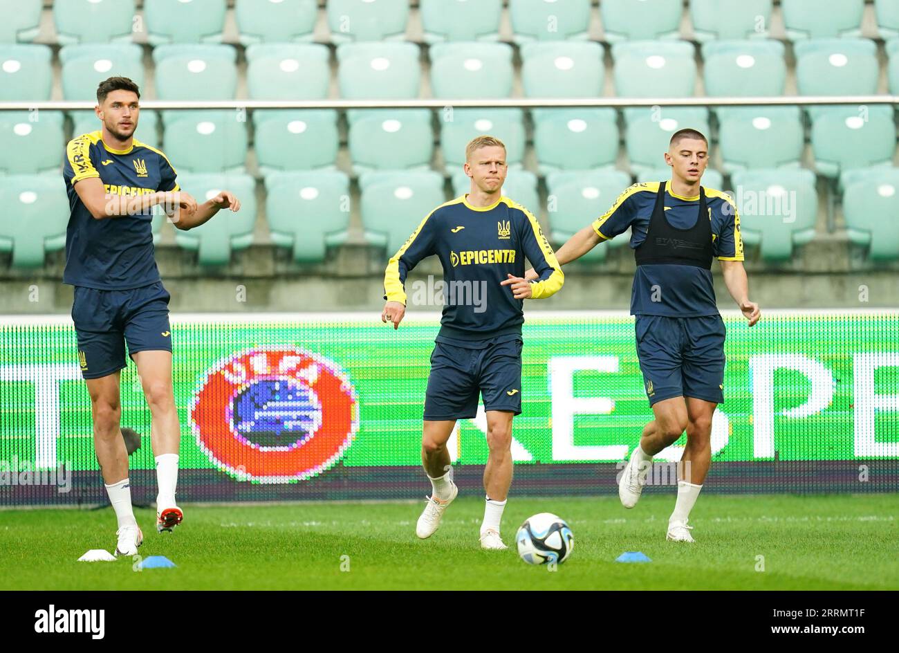 Ukraines Oleksandr Zinchenko Centre And Vitalii Mykolenko Right