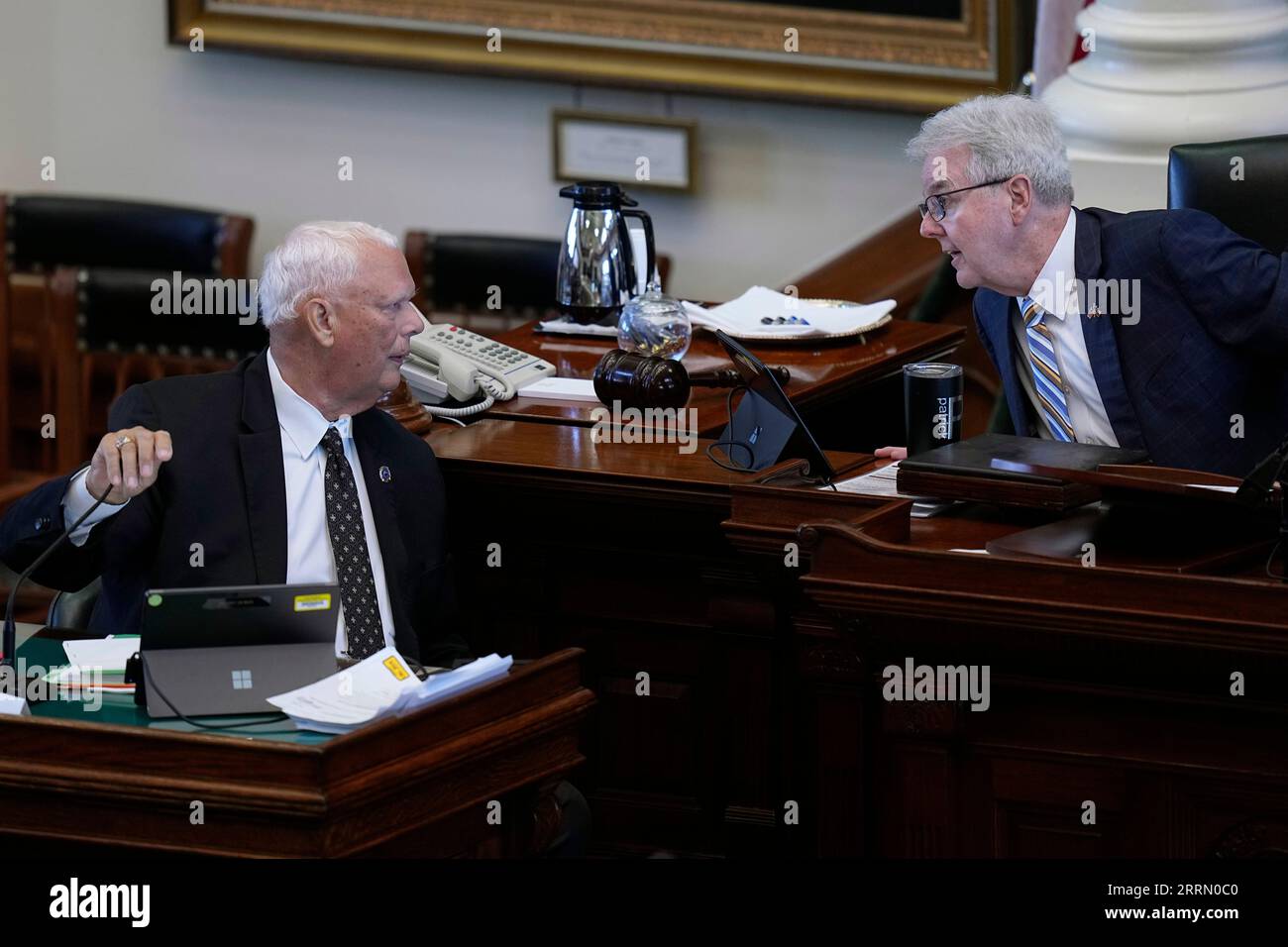 Texas Lt. Gov. Dan Patrick, right, talks with witness David Maxwell ...