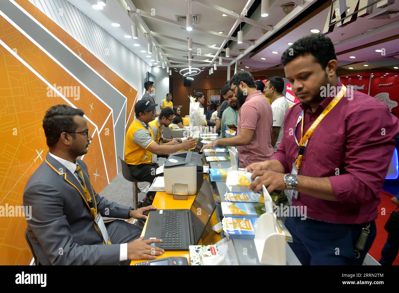 221202 -- DHAKA, Dec. 2, 2022 -- Visitors are seen at an exhibition ...