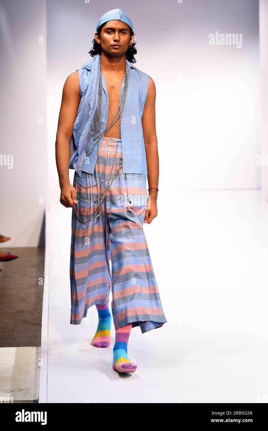 221203 -- COLOMBO, Dec. 3, 2022 -- A model presents a creation during ...