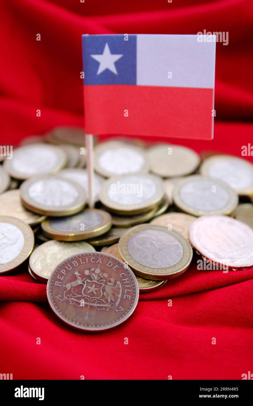 Flag and coin with chilean shield Stock Photo - Alamy
