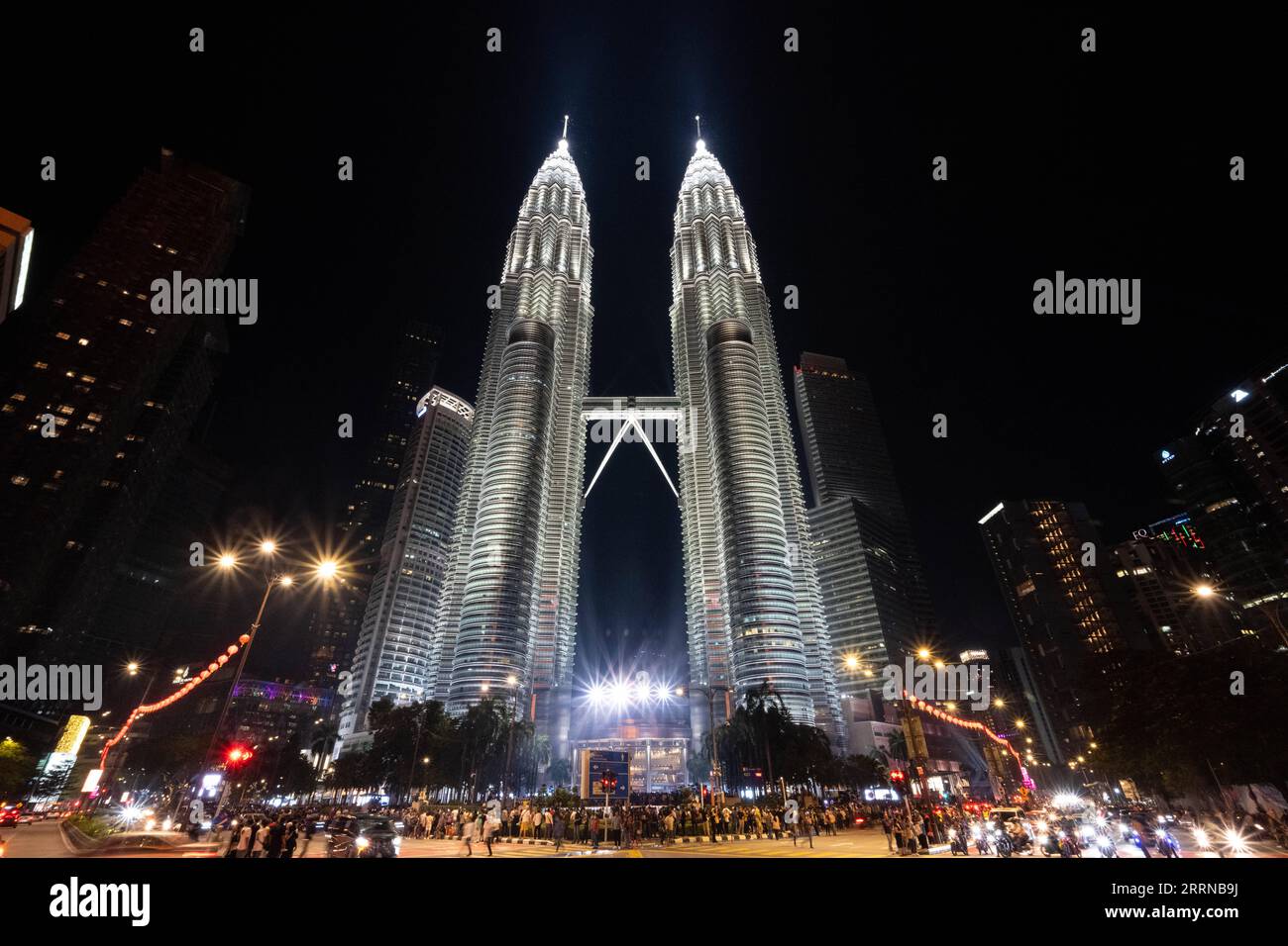 230101 -- KUALA LUMPUR, Jan. 1, 2023 -- People gather in front of the ...