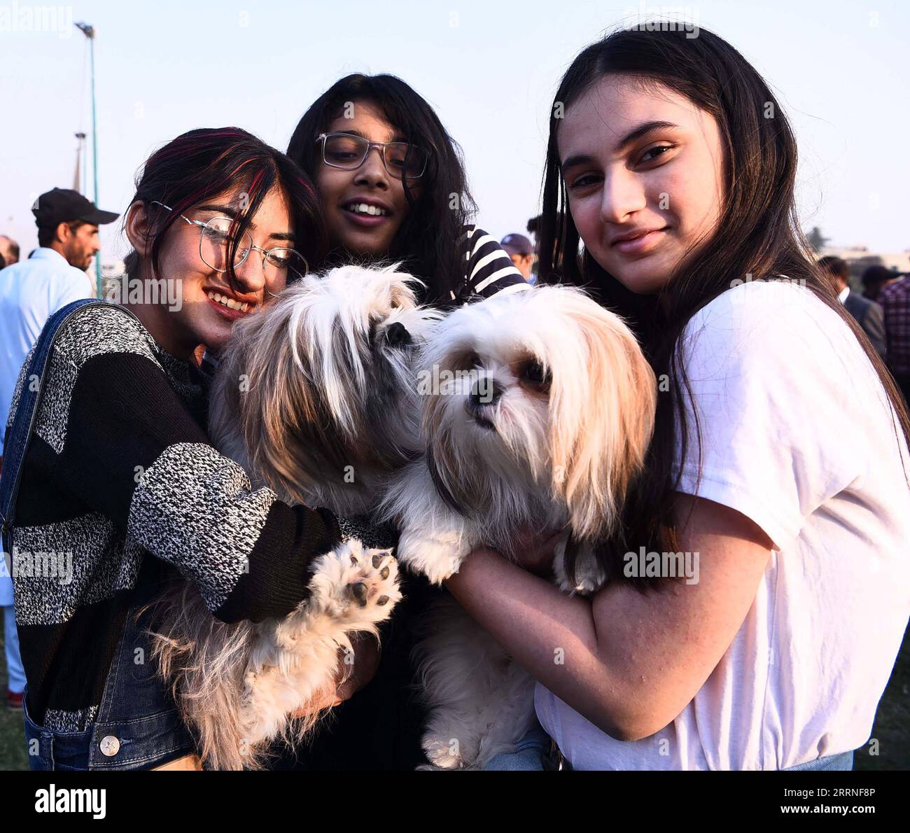230109 -- KARACHI, Jan. 9, 2023 -- Girls pose for a photo with their ...