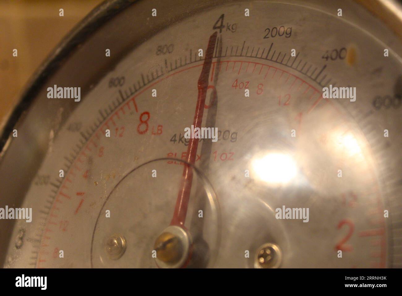 A photo of the handle on the weighing scales in the kitchen Stock Photo ...