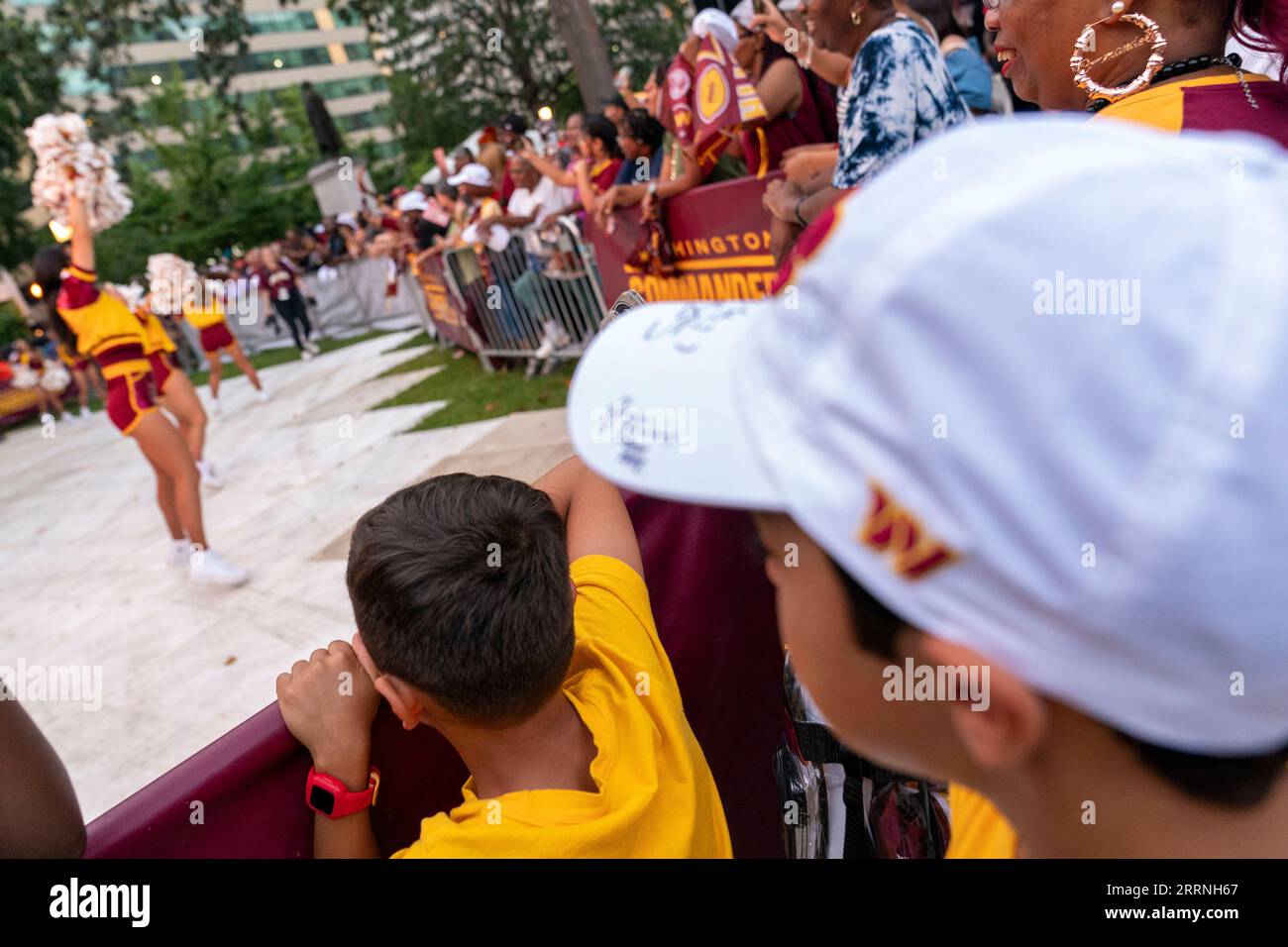 The crowd watches the Washington Commanders cheerleaders perform during ...