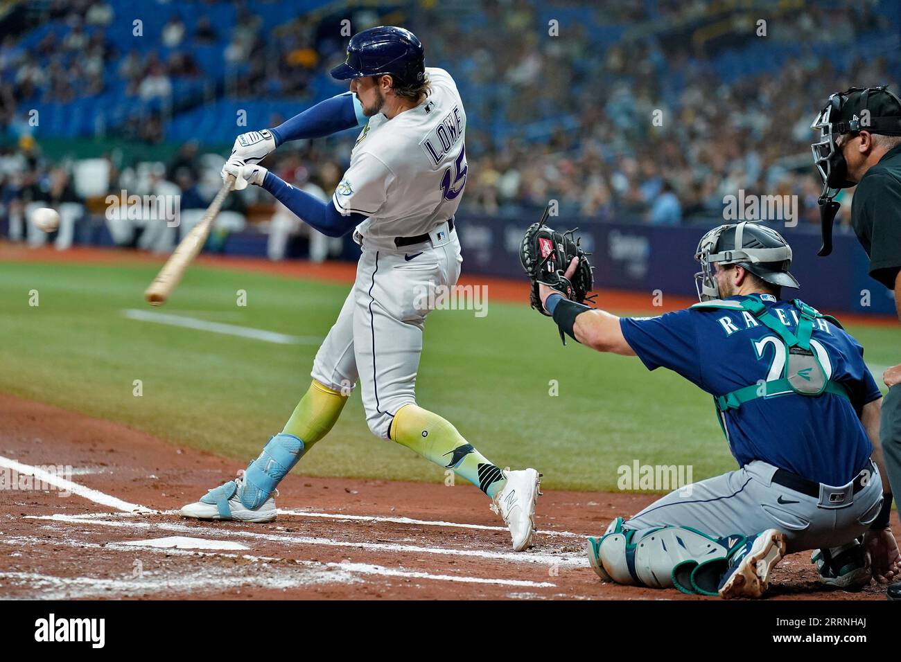 Tampa Bay Rays' Josh Lowe (15) connects for a run scoring sacrifice fly ...