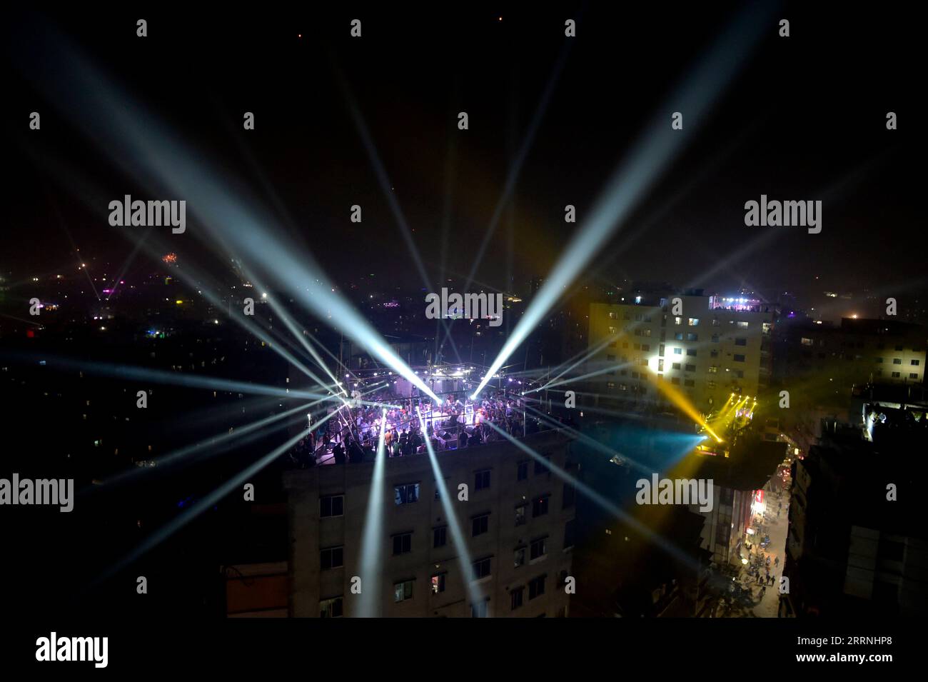 230115 -- DHAKA, Jan. 15, 2023 -- People gather on a roof to celebrate ...