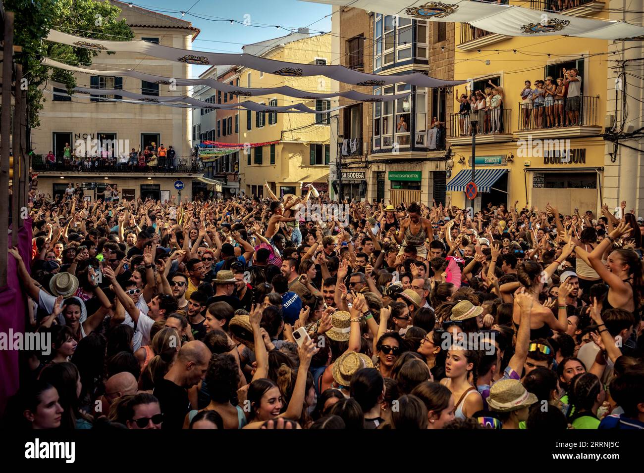 Mahon, Spain. 8th Sep, 2023. The cheering crowd dances during the ...