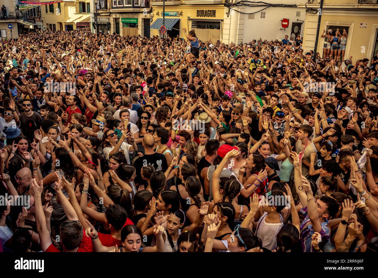 Mahon, Spain. 8th Sep, 2023. The cheering crowd dances during the ...