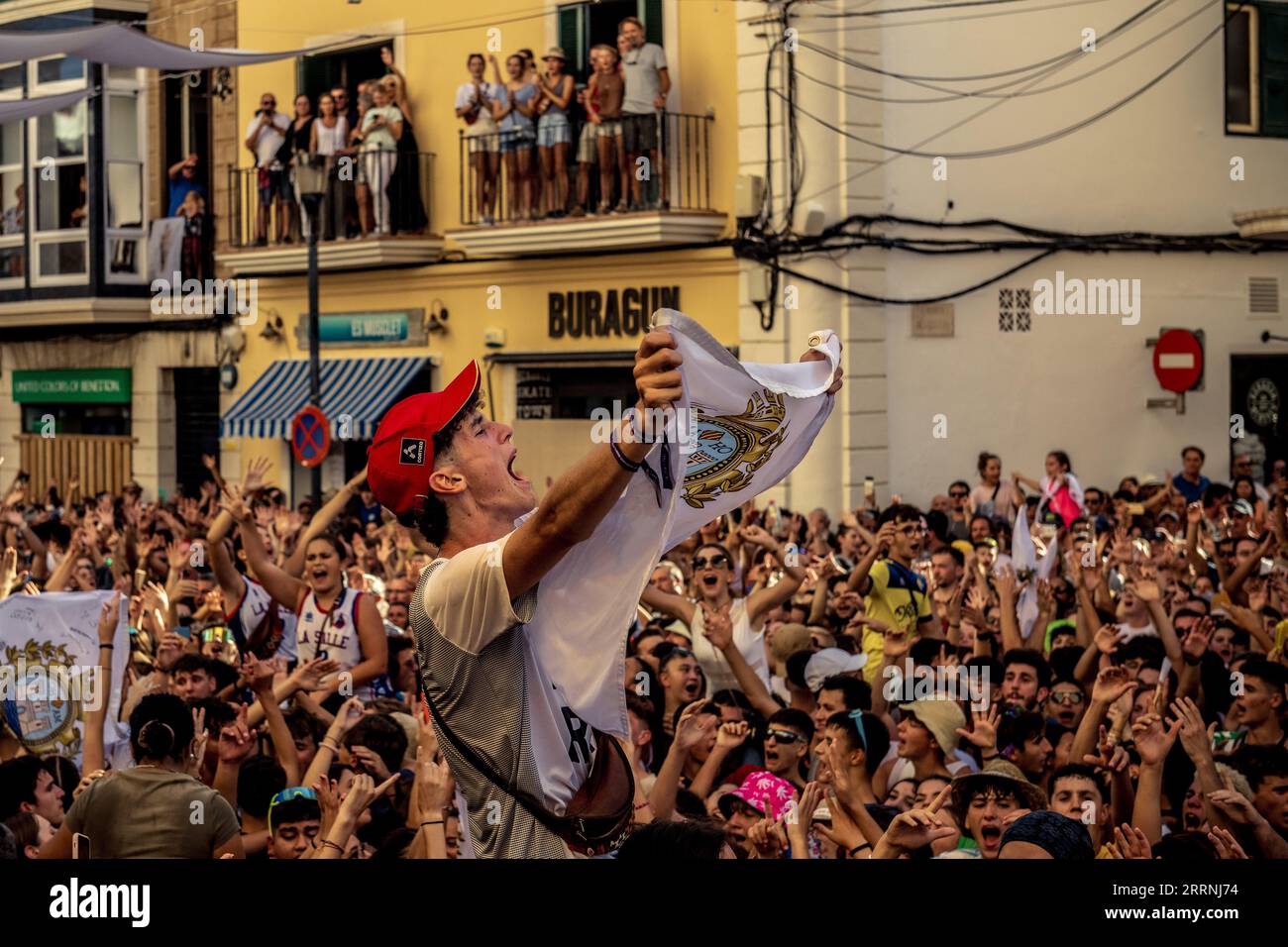 Mahon, Spain. 8th Sep, 2023. The cheering crowd dances during the ...