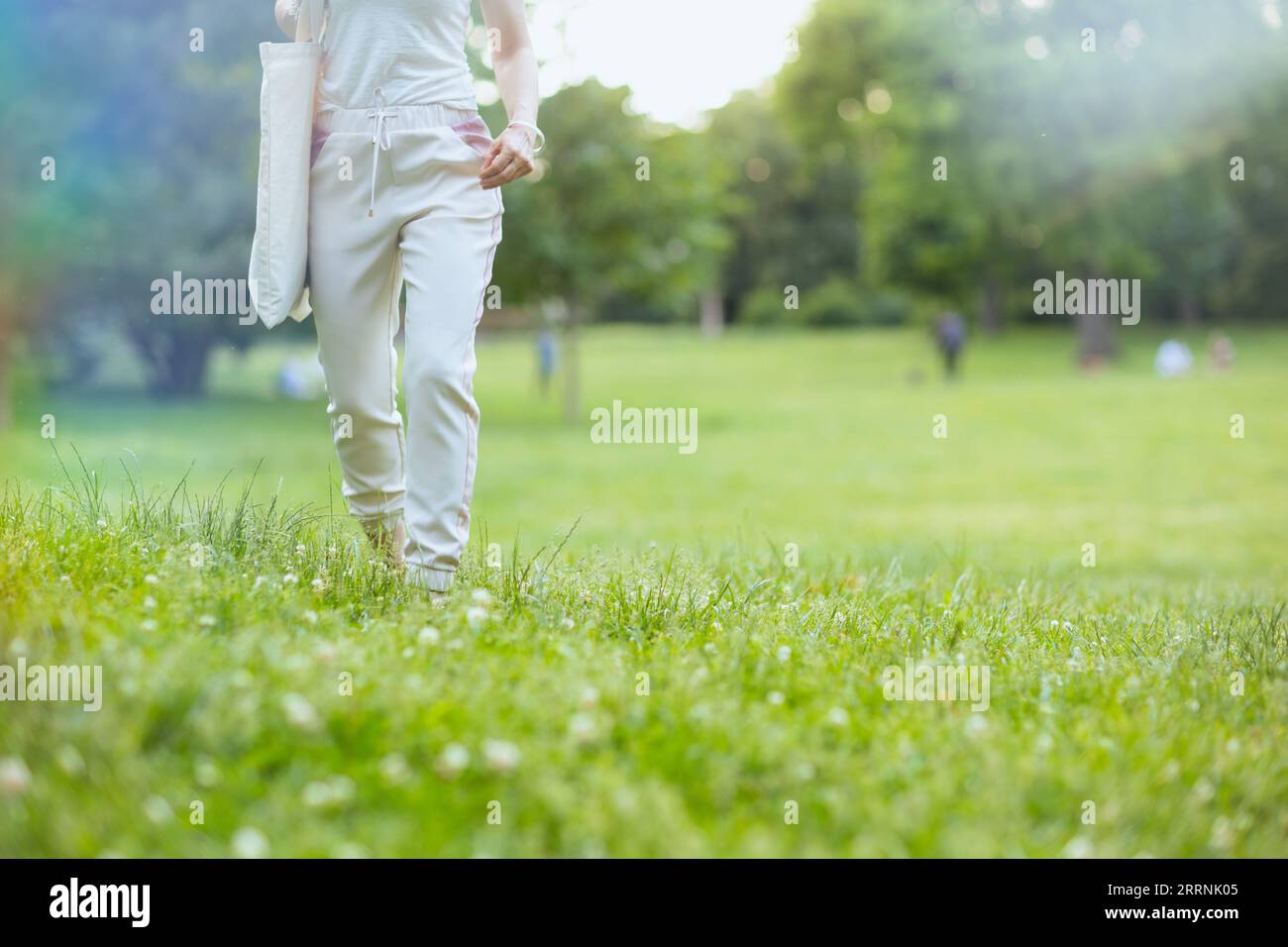 Woman walk on meadow summer hi-res stock photography and images - Alamy