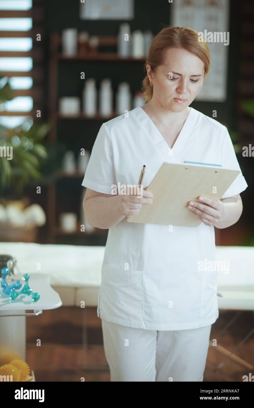 Healthcare Time Female Massage Therapist In Massage Cabinet With