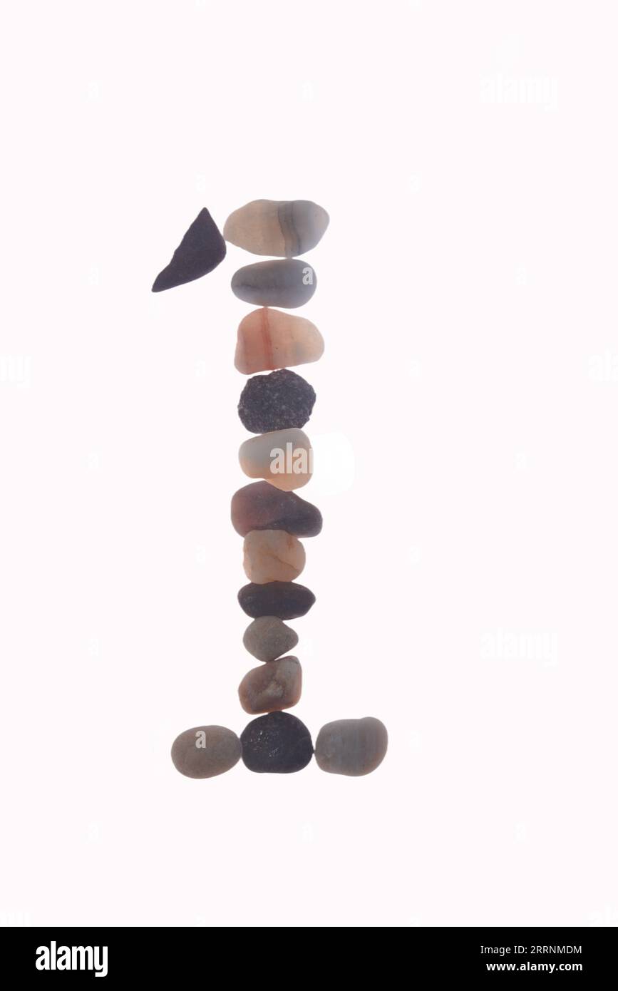 Number 1 handcrafted using small stones or pebbles, single object ...