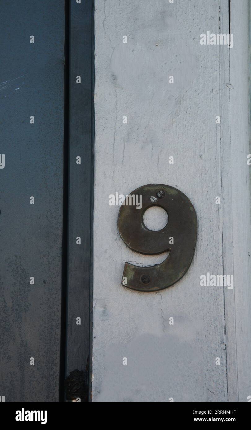 Old worn number 9, showing its age, pattern, lines and boldly grabbing ...