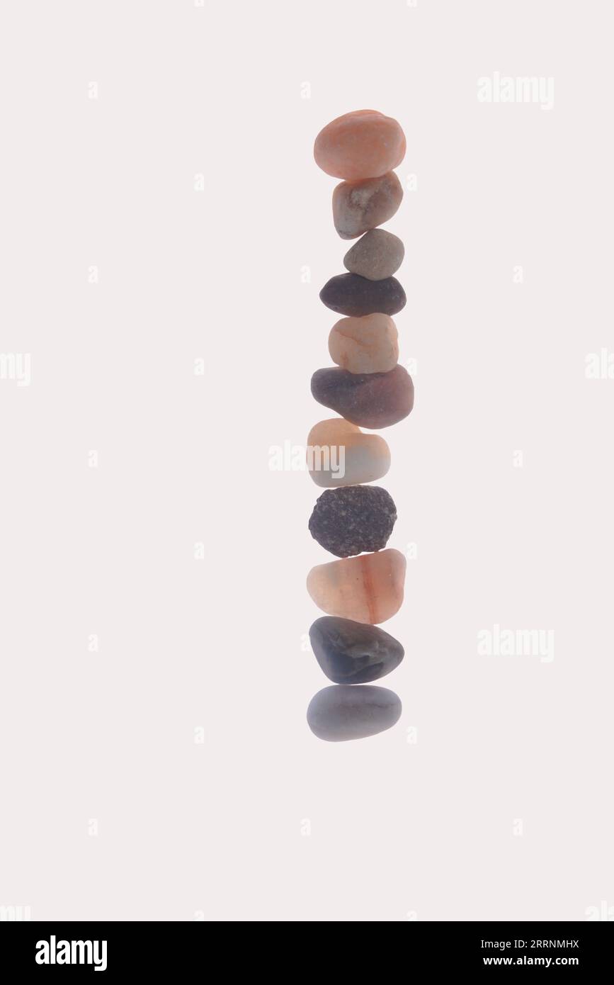 Letter I handcrafted using small stones or pebbles, single object ...