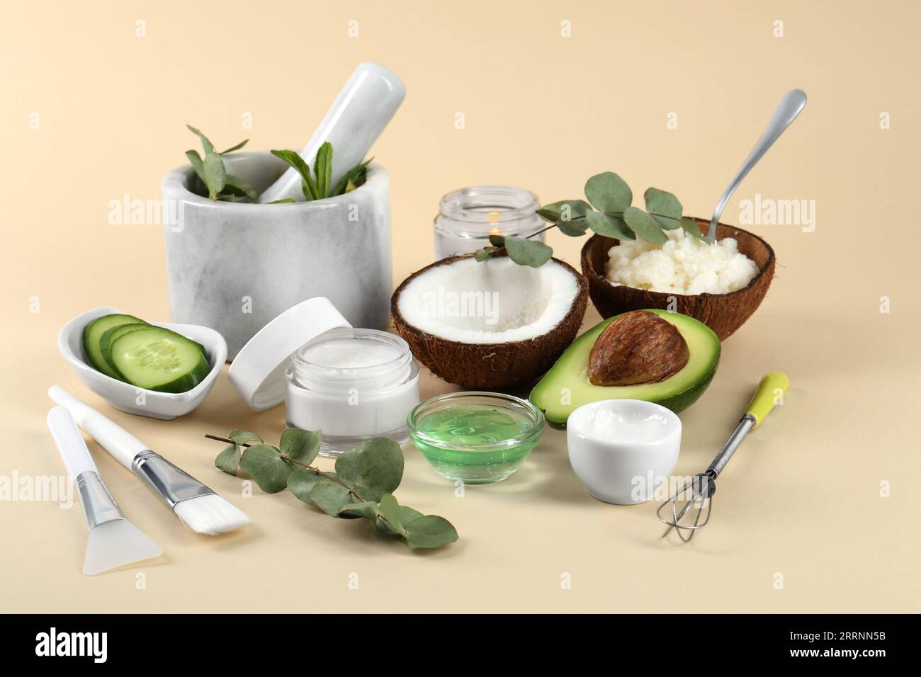 Homemade cosmetic products, tools and fresh ingredients on beige ...