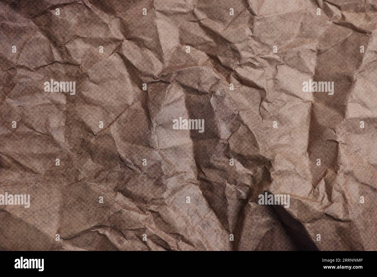 Texture of crumpled parchment paper as background, top view Stock Photo ...