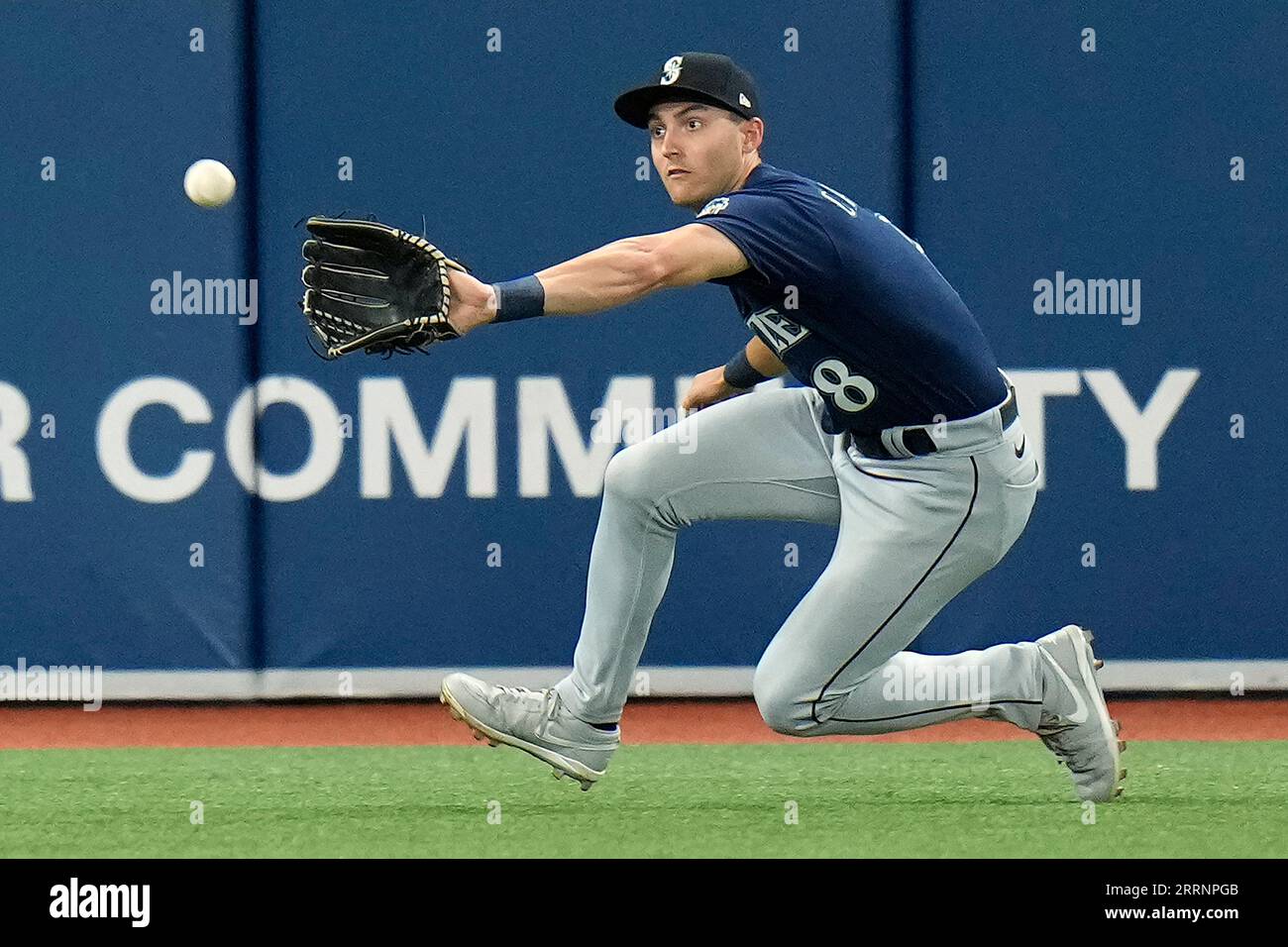 Seattle Mariners left fielder Dominic Canzone makes a catch on a fly ...
