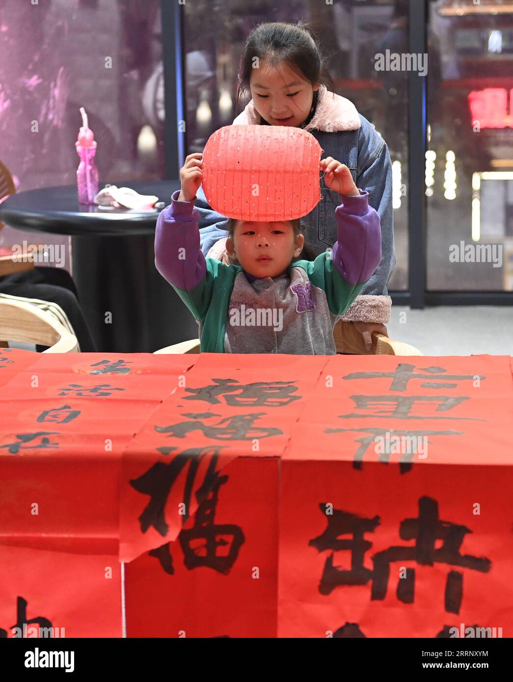 230205 -- ANYANG, Feb. 5, 2023 -- Children are seen at a town themed on ...