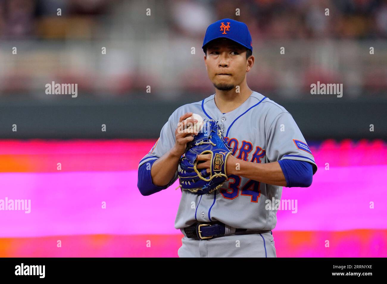 New York Mets starting pitcher Kodai Senga reacts after an RBI double ...