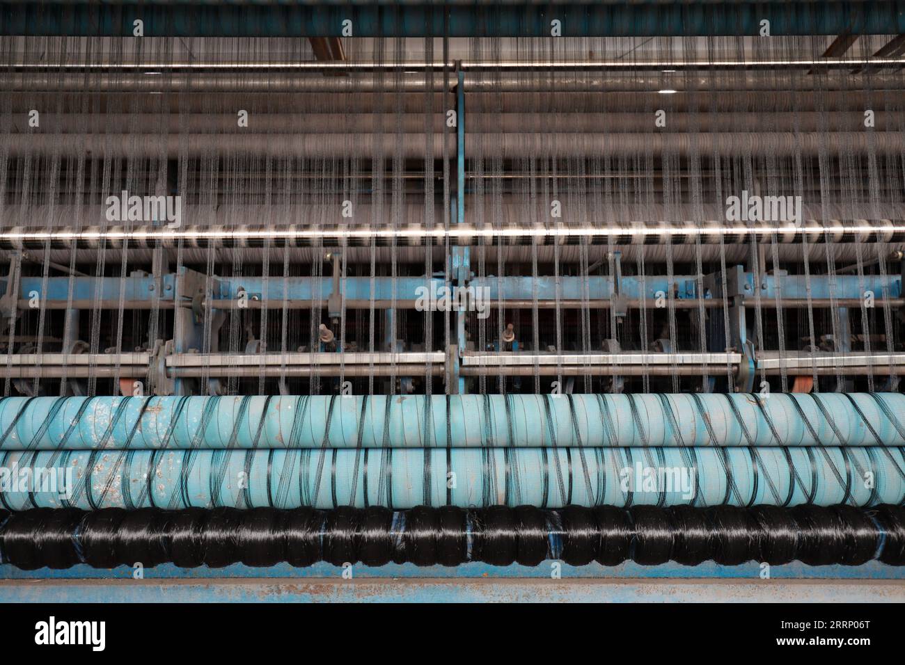 The fishing net production line is in a net farm Stock Photo - Alamy