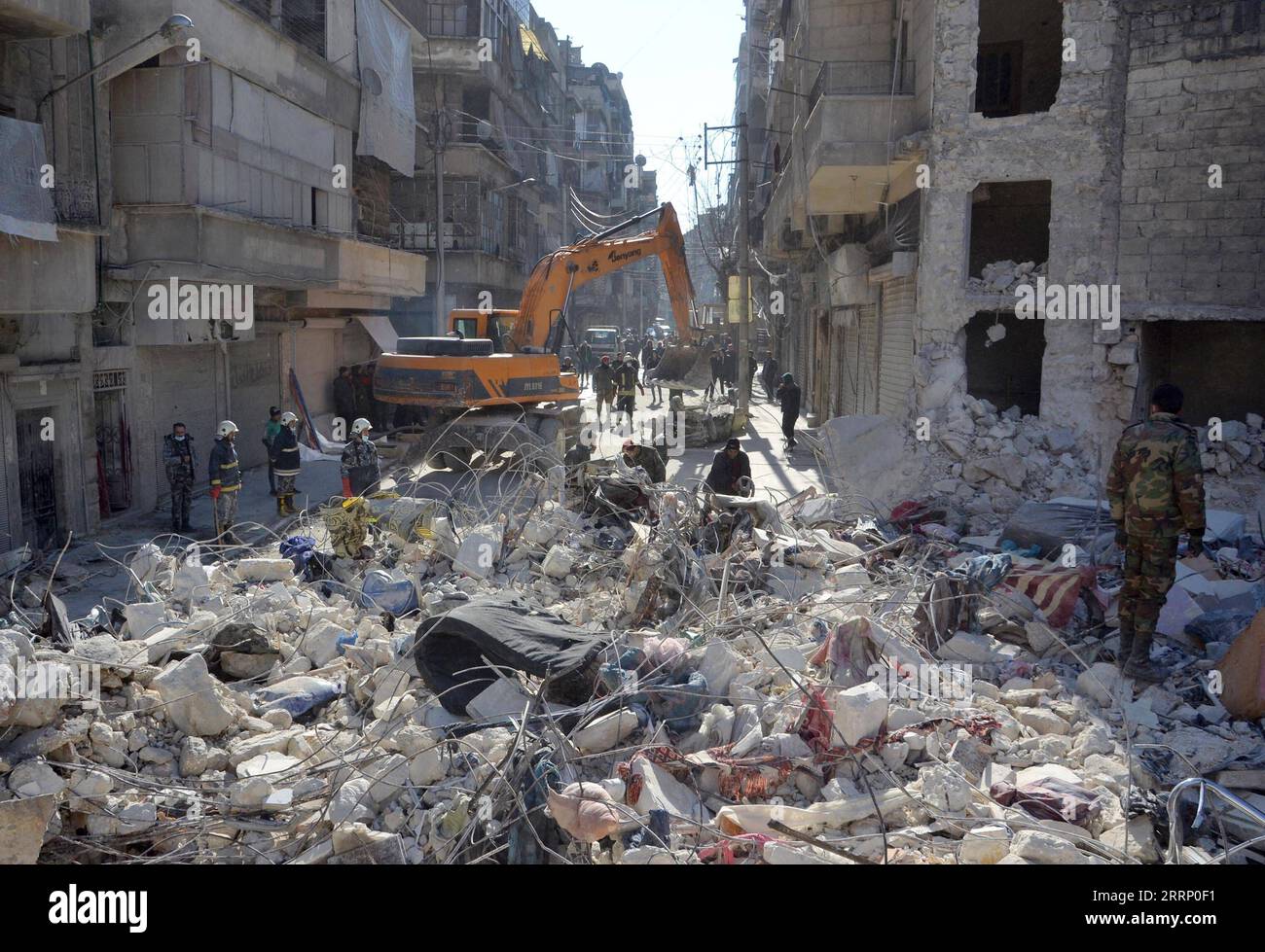 230208 -- ALEPPO SYRIA, Feb. 8, 2023 -- Rescue workers search for ...
