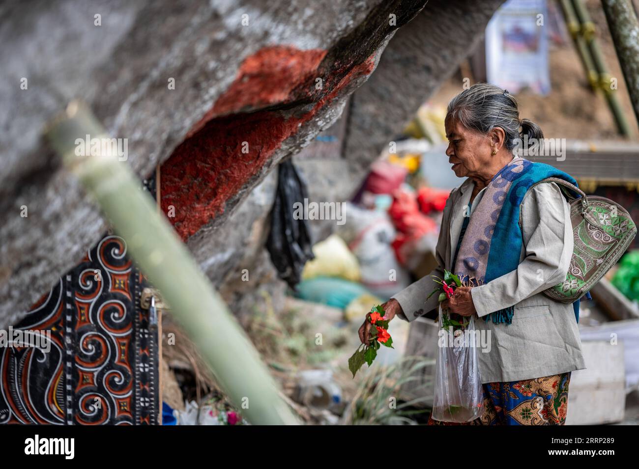 North Toraja, Indonesia. 03rd Sep, 2023. A family member visits the ...