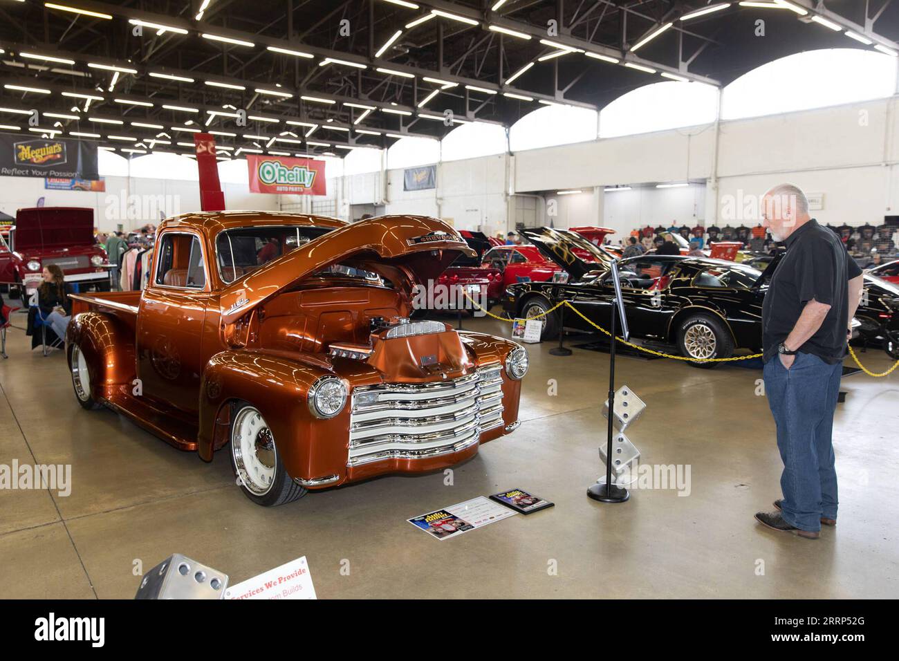 230220 -- DALLAS, Feb. 20, 2023 -- A man looks at a 1954 Chevrolet at ...