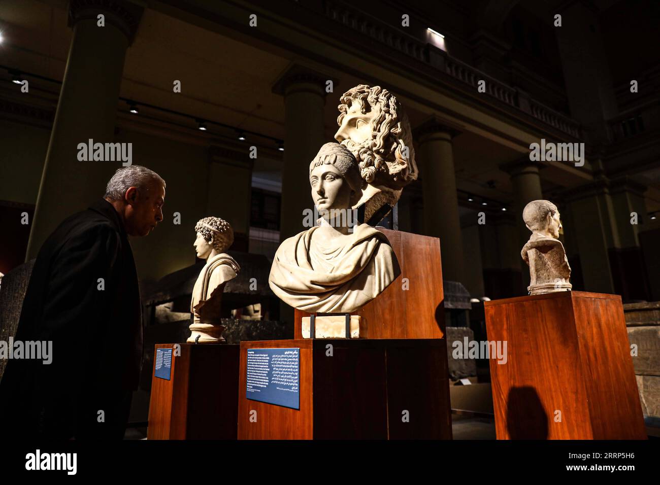 230221 -- CAIRO, Feb. 21, 2023 -- A visitor views antiquities at the Egyptian Museum after its ...