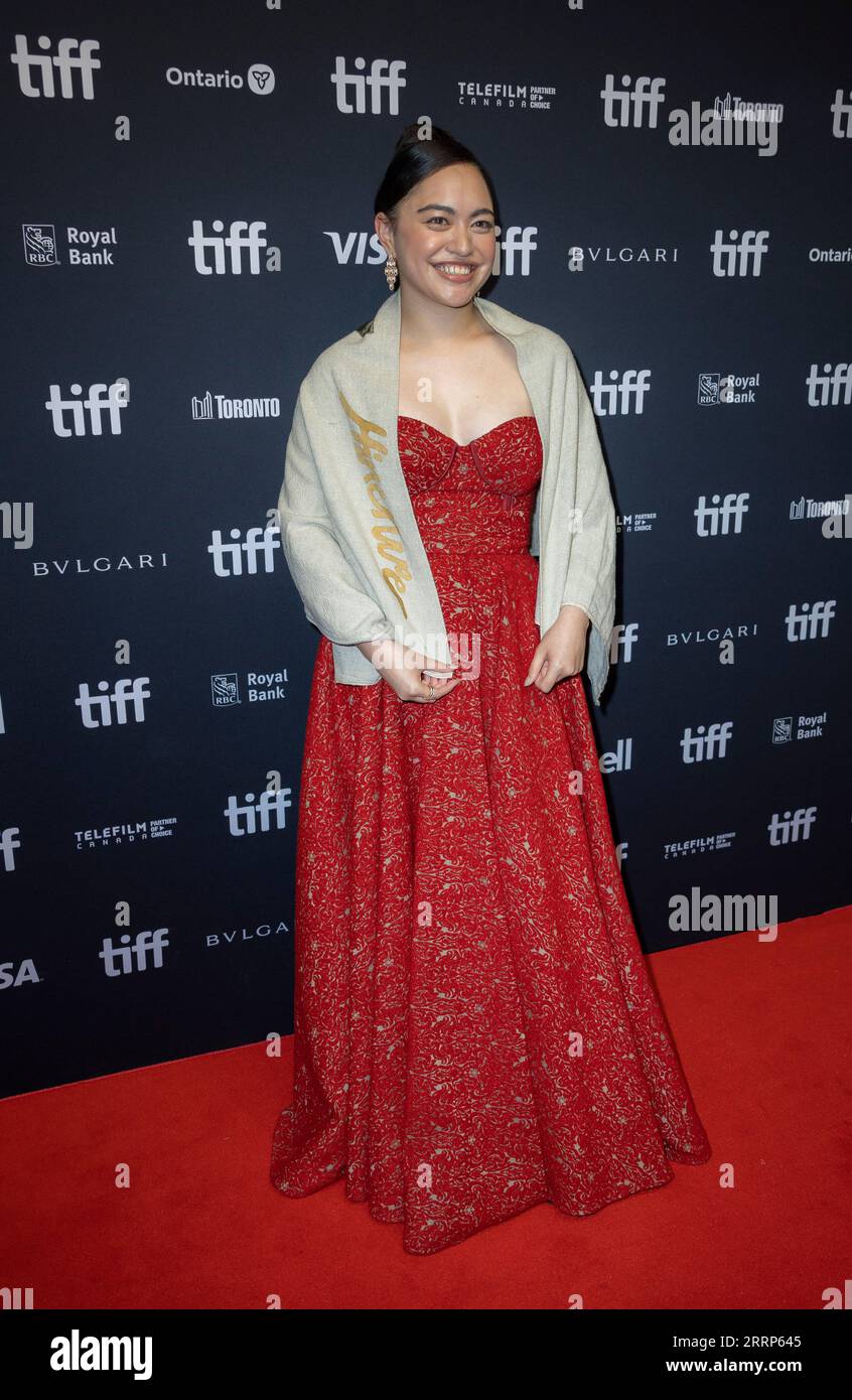 Tioreore Ngatai-Melbourne hold up a scarf displaying her heritage as ...