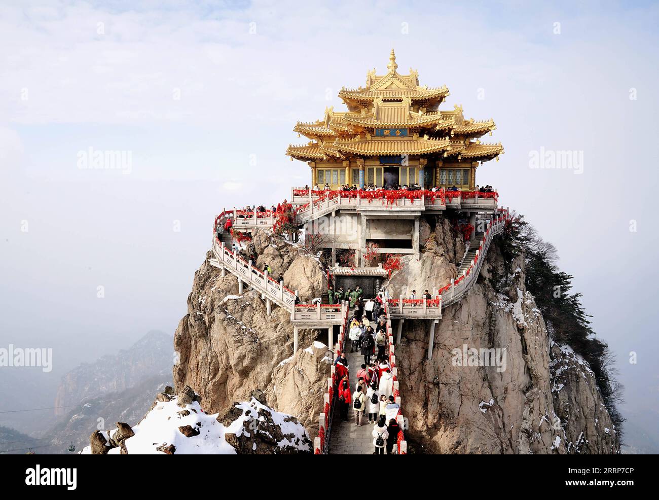 230227 -- LUOYANG, Feb. 27, 2023 -- Tourists visit the Laojun Mountain ...