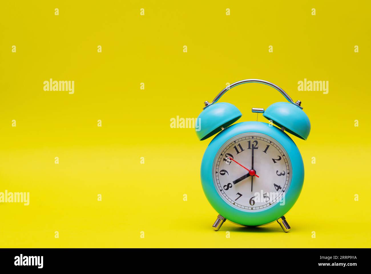 Yellow background alarm clock hi-res stock photography and images - Alamy