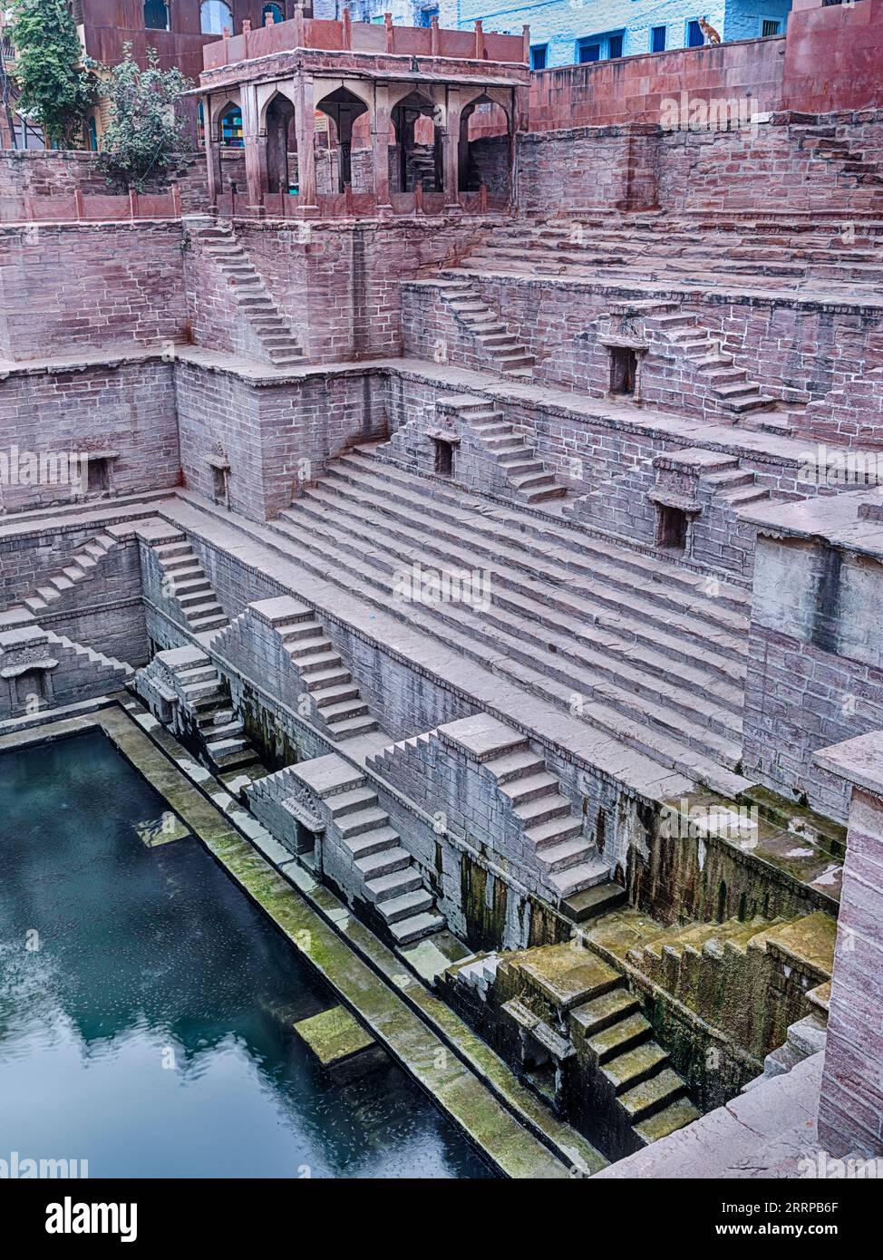 One wall of the Jodhpur step well (Toorji Ka Jhalra Bavdi) shows a ...