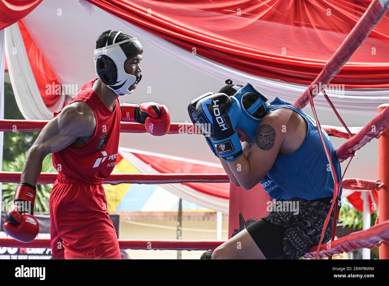 230311 -- JAKARTA, March 11, 2023 -- Amateur boxers compete during ...