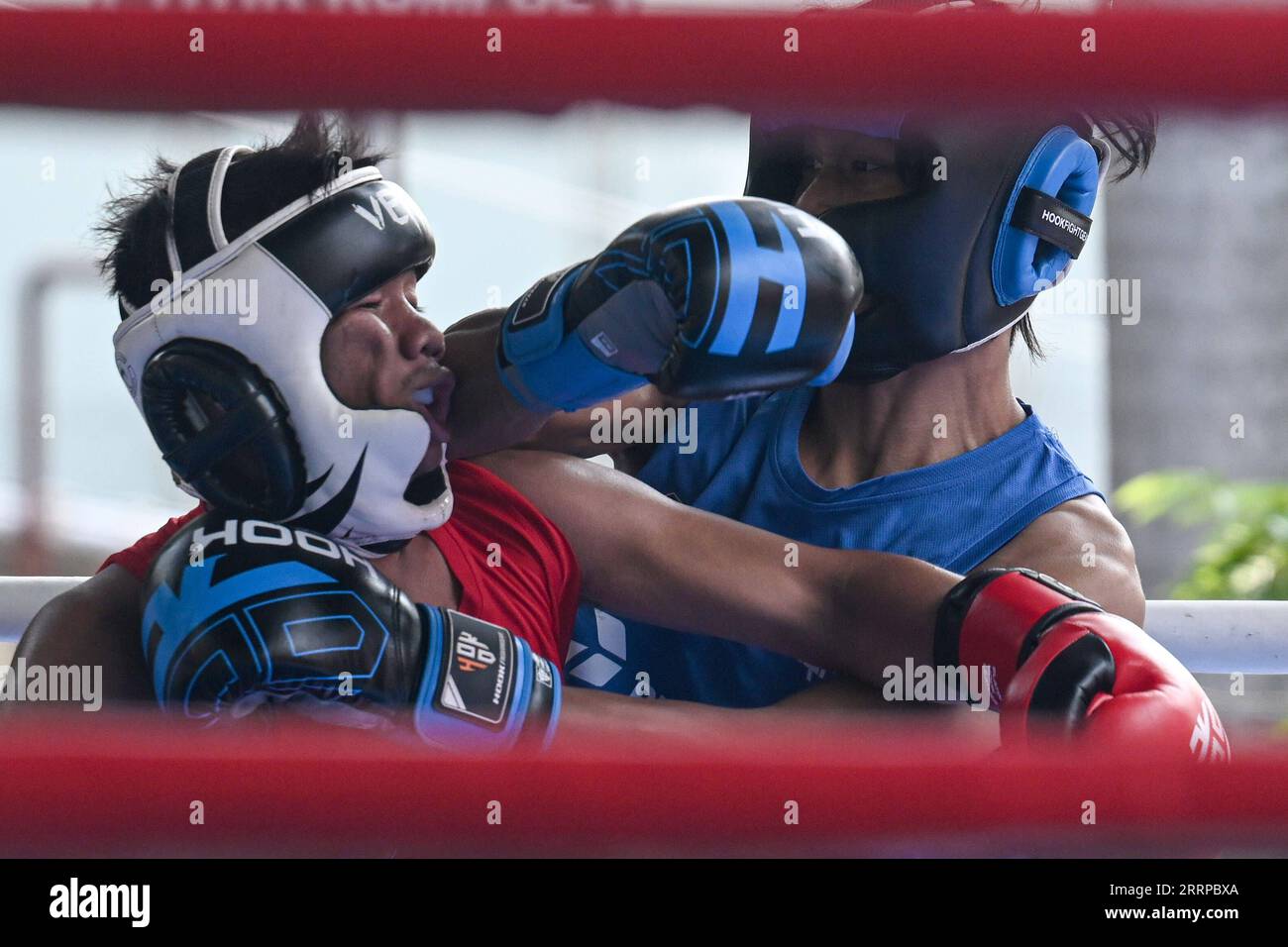 230311 -- JAKARTA, March 11, 2023 -- Amateur boxers compete during Jakarta Boxing Open in ...