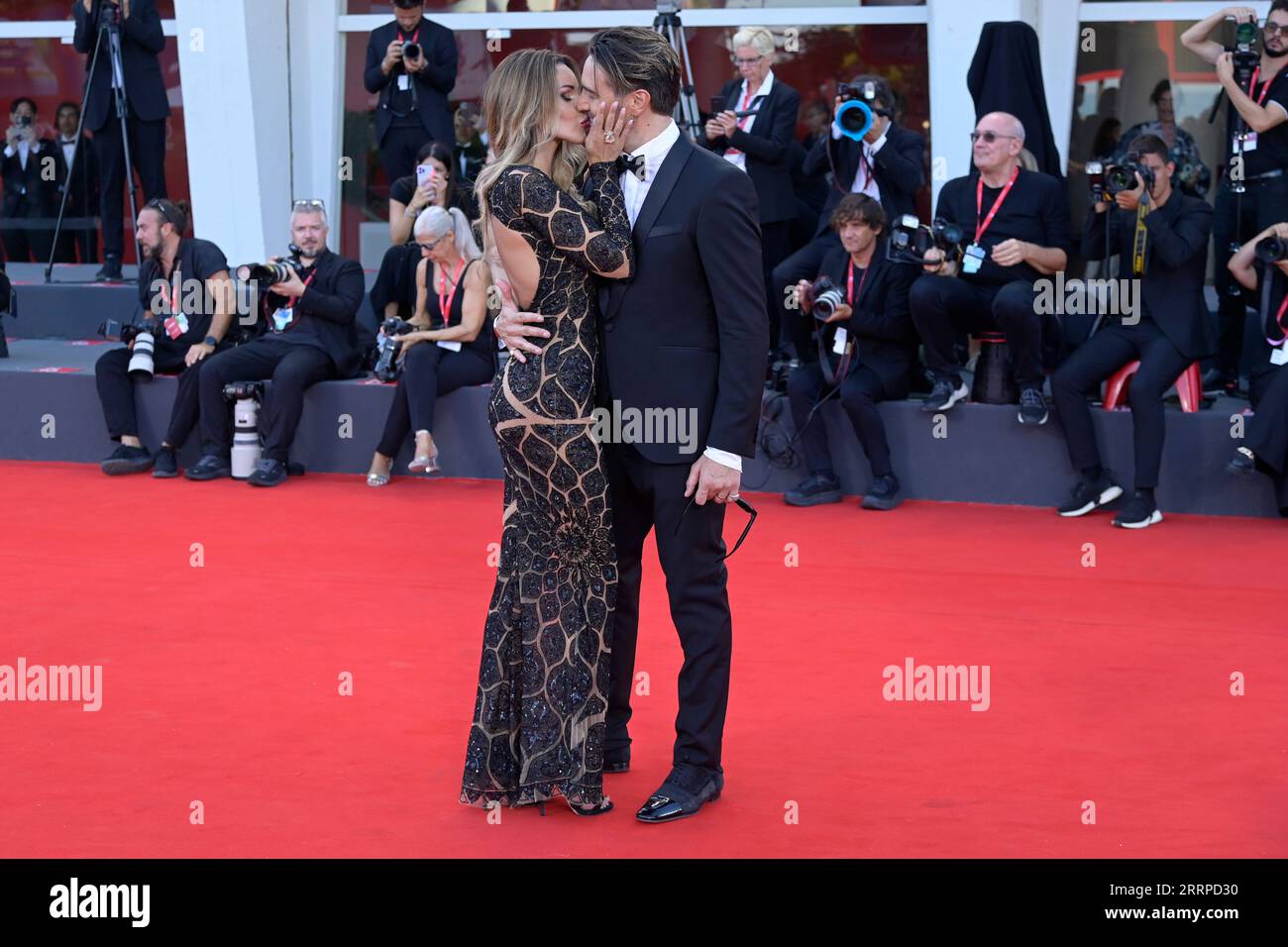 Venice Lido, Italy. 08th Sep, 2023. Delia Duran (L) and Alex Belli (r) attend the red carpet of ...