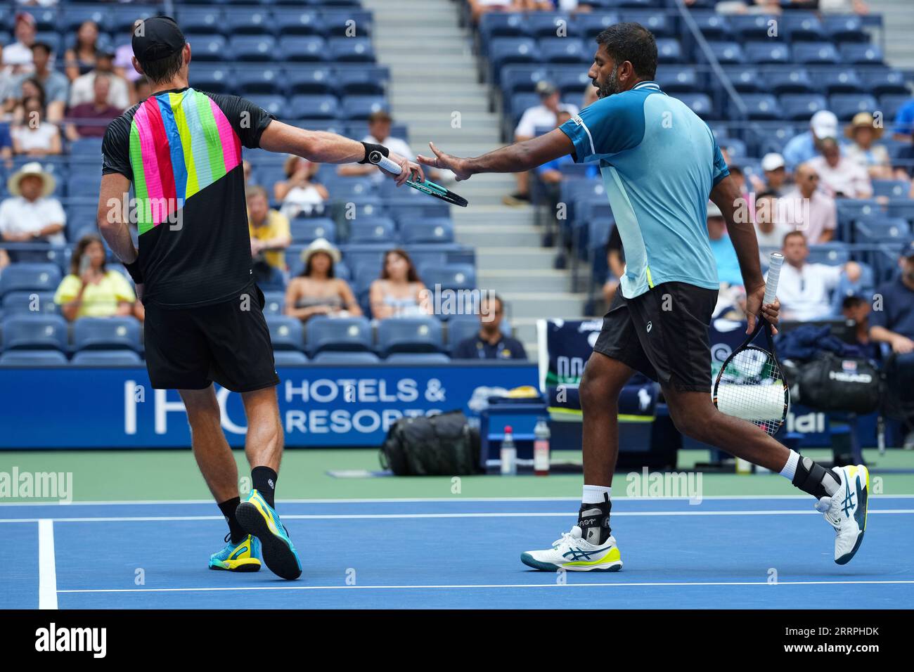 Rohan Bopanna and Matthew Ebden high five during a men's doubles ...