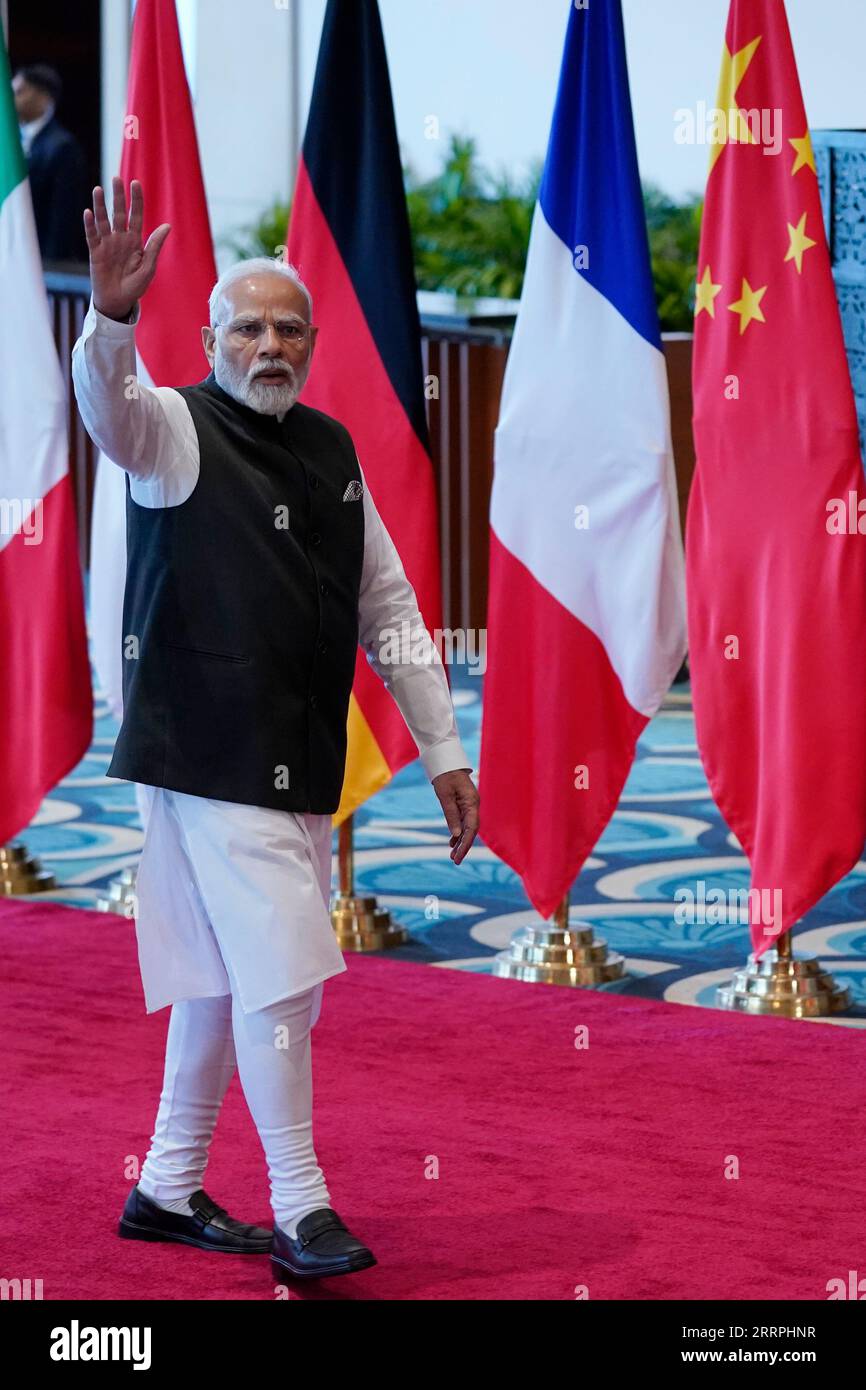 Indian Prime Minister Narendra Modi waves as he arrives at Bharat ...