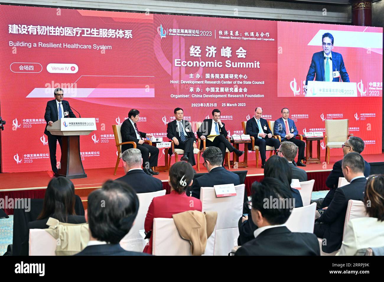 230327 -- BEIJING, March 27, 2023 -- Delegates attend a parallel ...