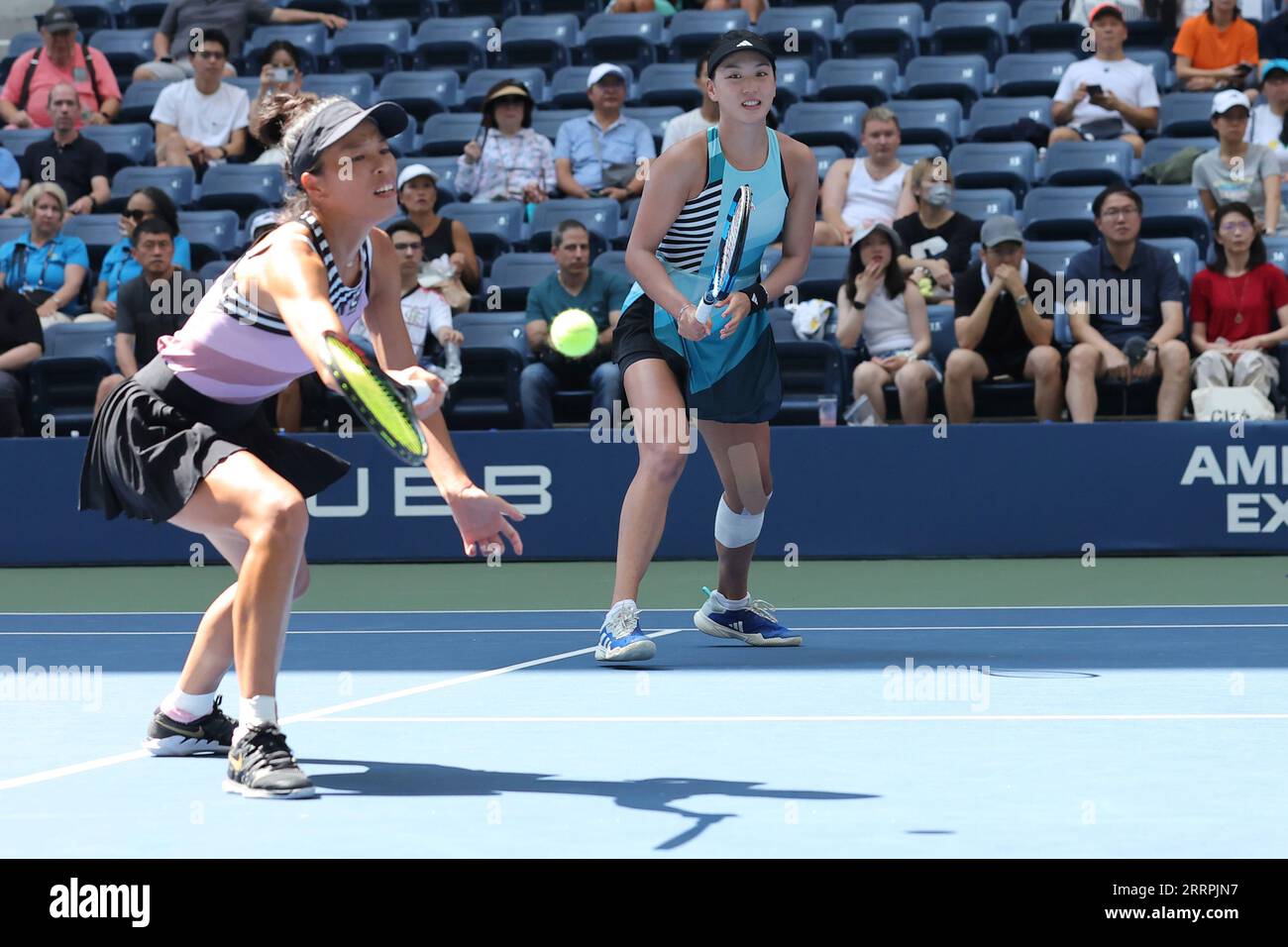 Xinyu Wang and Su-Wei Hsieh in action during a women's doubles ...
